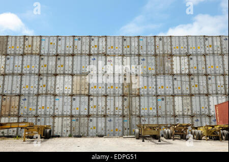 Stacked Containers in Storage Depot Stock Photo - Alamy