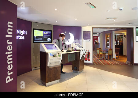 Maidstone Premier Inn Hotel lobby with receptionist. Reopened in 2013 ...