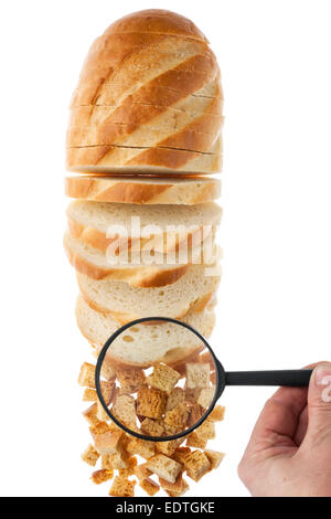 loaf of bread on a man's hand isolated on gray background close up ...