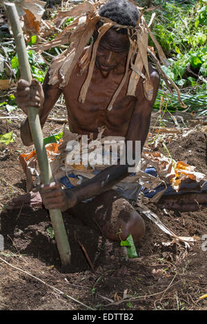 Melanesia, Vanuatu, Rano Island. Village man in traditional wooden ...