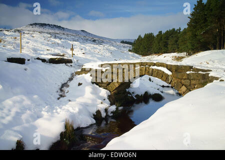 Packhorse bridge over Burbage Brook, below Carl Wark, Peak District, UK ...