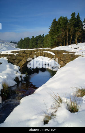 Packhorse bridge over Burbage Brook, below Carl Wark, Peak District, UK ...