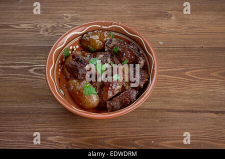 Afelia - a traditional Greek and Cypriot food. pork marinated and ...