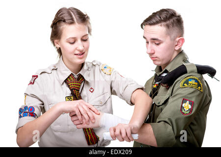 First scout medical aid with bandage isolated on white background Stock ...