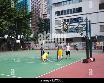 People playing at Basketball court in Colle Oppio Park during the ...