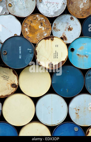 stack of old fuel tanks background Stock Photo - Alamy