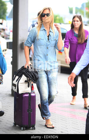 Bar Refaeli and her husband arriving at Tegel airport for the Mercedes ...