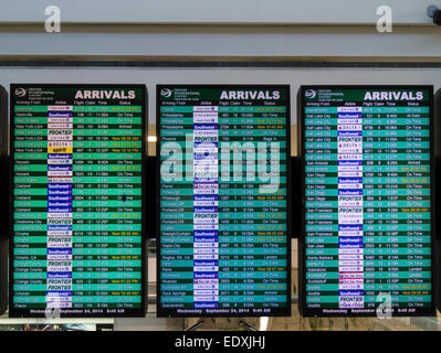 flight schedule monitor at airport Stock Photo - Alamy