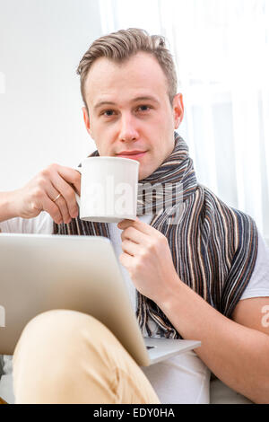 Man catching cold Stock Photo - Alamy
