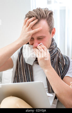 Man catching cold Stock Photo - Alamy