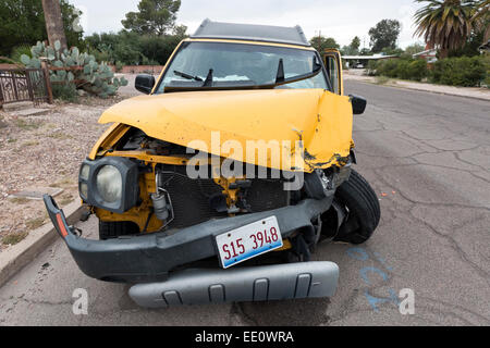 Smashed up yellow SUV Stock Photo - Alamy