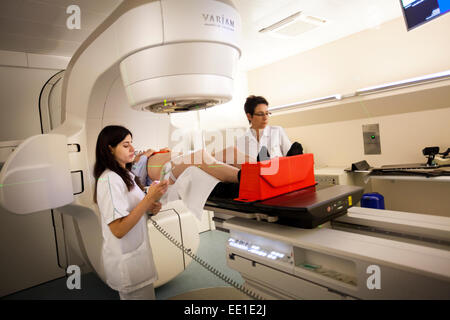 Prostate cancer radiotherapy surgery. Patient under general anaesthetic ...