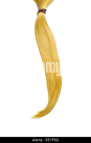 A strand of blond hair on a white background. Close-up Stock Photo - Alamy