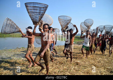 Nagaon, Assam, India. 13th Jan, 2015. An Indian villager displays his ...