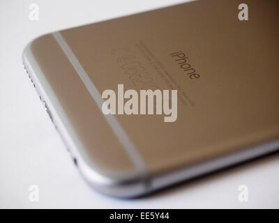 The back of a gold Apple iphone - New Iphone on a white background ...