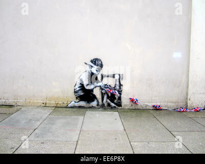 banksy boy making union flag bunting turnpike lane poundland north ...