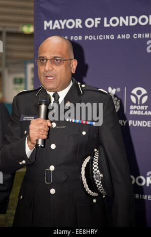 Met Commander Mak Chishty makes a speech next to Boris Johnson at the ...