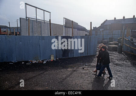 Belfast, 1972: Early peace wall separating Catholic and protestant ...