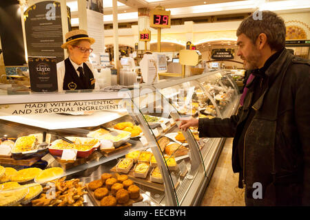 Staff in the Charcuterie department, Harrods department store food hall ...
