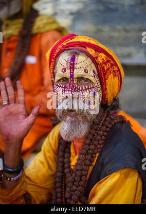 A Sadhu or Hindu holy man seen praying during the annual pilgrimage to ...