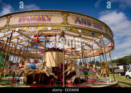 a vintage merry go round at a country fair near truro in cornwall,uk ...