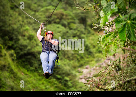 Oversized Adult Man On Zip Line Or Canopy Trip Nearby Of Banos De Agua ...