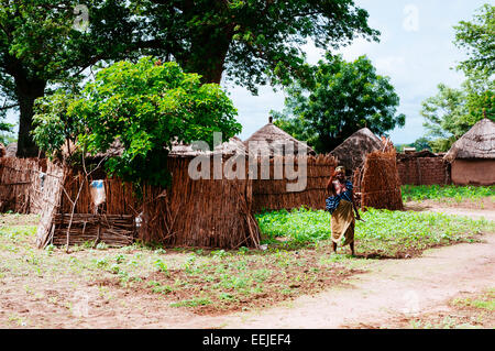 African mud huts thatched with straw Shona village recreation Zimbabwe ...