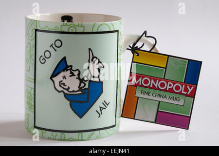 Monopoly fine china mug - Go to jail set on white background Stock ...