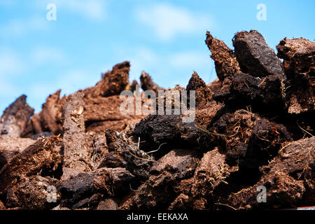 pile of irish peat turf fuel drying in the bog Stock Photo - Alamy