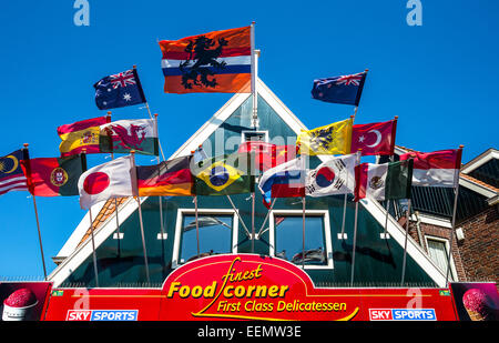 Amsterdam, Waterland district, Volendam, flags of a shop of the town ...