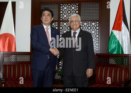 Ramallah. 20th Jan, 2015. Japan's Prime Minister Shinzo Abe (L) reviews ...