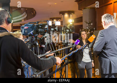 Media, TV cameras at a press conference Stock Photo - Alamy