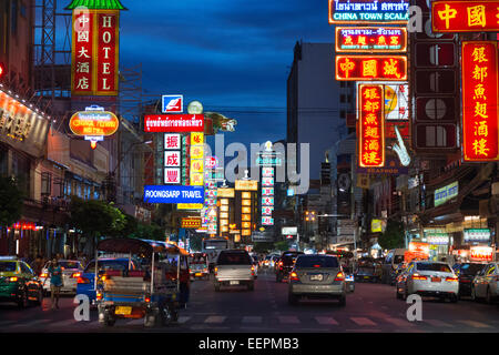 View down Thanon Yaowarat road at night in central Chinatown district of Bangkok Thailand ...