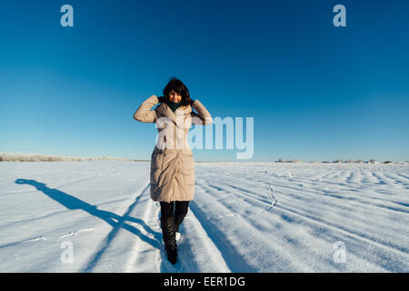 Girl model with white hair in a retro dress with ruffles in a green ...