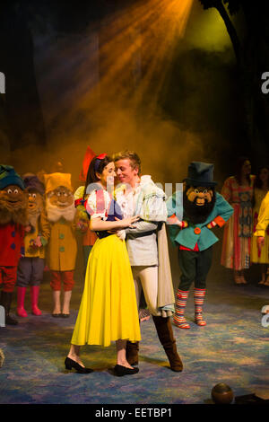 A cast of amateur actors performing in their elaborate costumes on ...