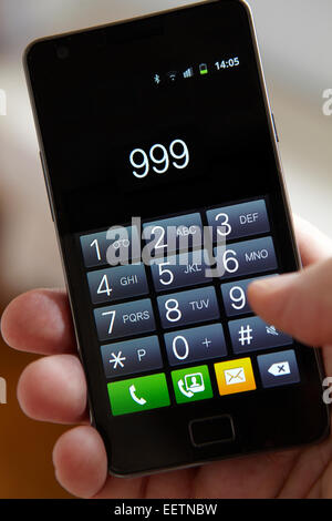 Dialling 999 for emergency services Stock Photo - Alamy