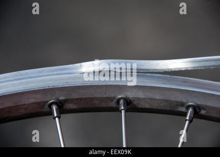 Damaged bicycle wheel rim Stock Photo - Alamy