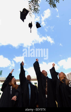Graduation cap, excited friends and throw in air for celebration, study ...