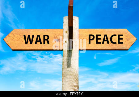Wooden road sign with words peace, democracy, respect Stock Photo - Alamy