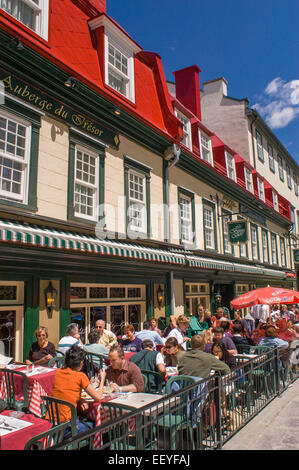 QUEBEC CITY, QUEBEC, CANADA - People eat and drink at outdoor tables in ...