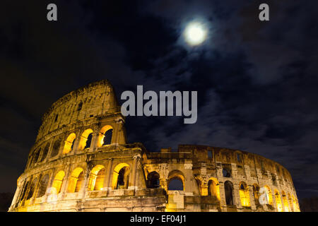 Colosseum by Night with full moon - Rome - Italy Stock Photo - Alamy