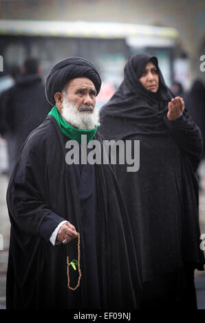 Mashhad, Iran. 23rd Jan, 2015. Iranian demonstrators hold up placards ...