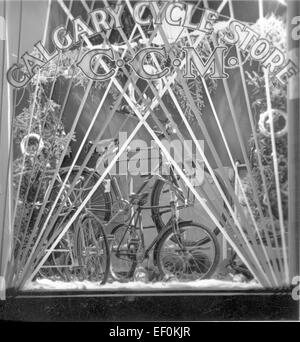 A festive Christmas window display at the Calgary Cycle Store showcases ...