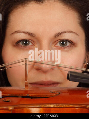 Face Behind Violin Stock Photo - Alamy