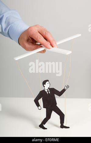 puppeteer and puppet business Stock Photo - Alamy