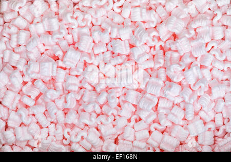 pink styrofoam packing peanuts background Stock Photo - Alamy