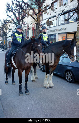Mounted police officers patrol a street in Kolkata, India, on June 2 ...