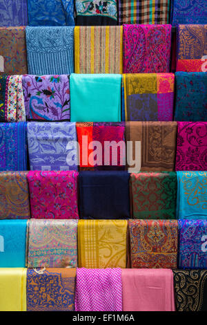 Closeup of textiles, scarves and shawls for sale at the Muttrah souq ...