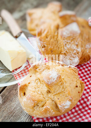 breakfast on table with bread buns, croissants, coffe and juice Stock ...