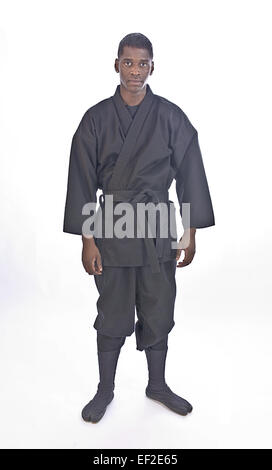 Studio shot of Japanese man looking at camera Stock Photo - Alamy